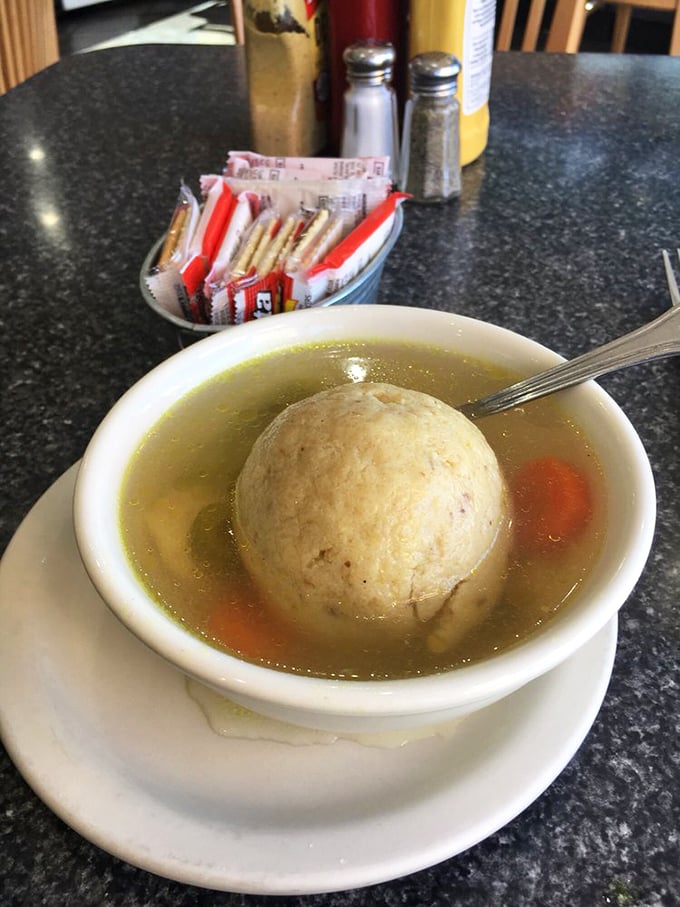 The perfect matzo ball reveals itself – not too dense, not too light. The Goldilocks of dumplings has been achieved!