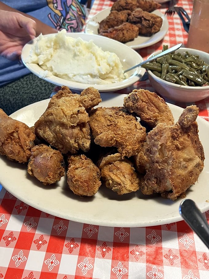 A platter of pan-fried chicken with all the fixings—proof that sometimes the simplest things are the hardest to perfect.
