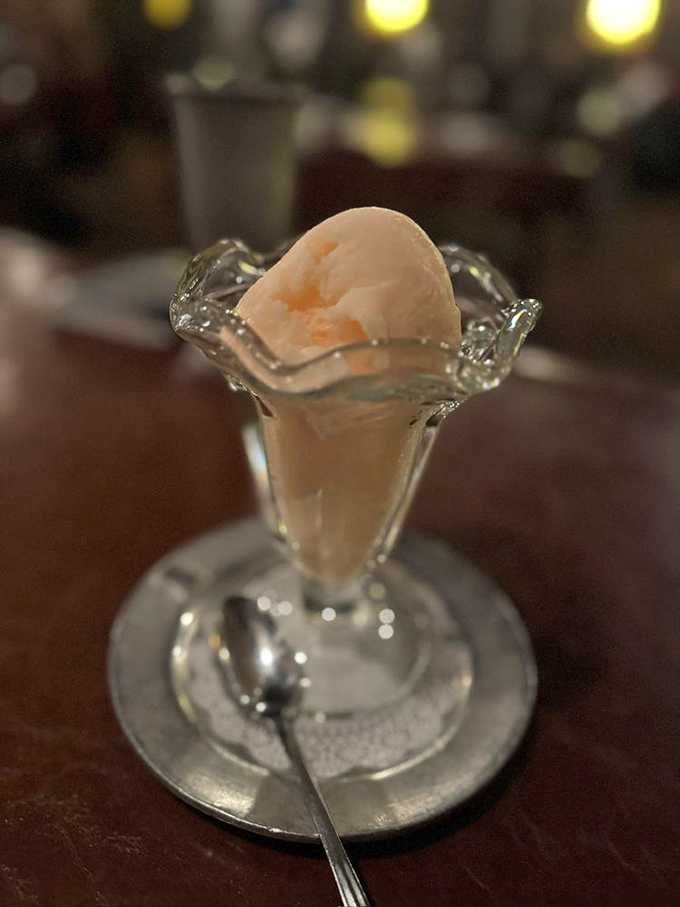 The sorbet arrives in a crystal dish like a tiny edible iceberg—the Titanic of desserts, except this is one disaster you'll want to experience.