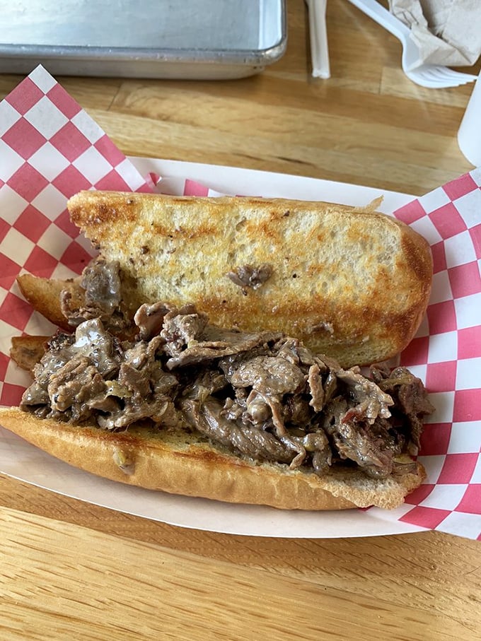 The star of the show: TJ's legendary cheesesteak with perfectly thin-sliced beef on a roll that maintains its structural integrity with every bite.