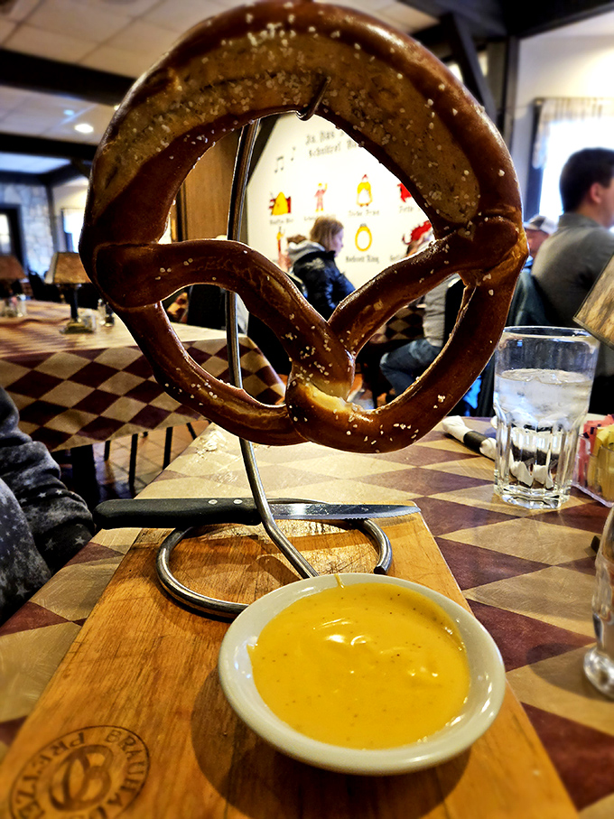The pretzel stand isn't just functional—it's theatrical. Like a carb-loaded Cirque du Soleil performer, this pretzel defies gravity while tempting your taste buds.