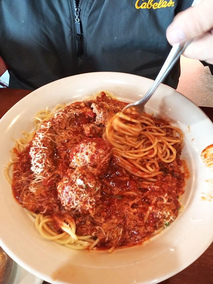 Those meatballs aren't just sitting on that spaghetti—they're holding court. The proper ratio of pasta to sauce to cheese is a beautiful thing.