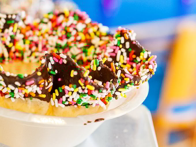This sundae masterpiece looks like it was designed by someone who understands that "too much" doesn't exist in the ice cream vocabulary. Sprinkles, whipped cream, and multiple flavors collide beautifully.