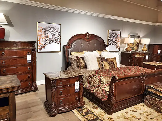 Regal bedroom furniture that makes you wonder if you've accidentally wandered into a luxury hotel suite instead of a furniture store.