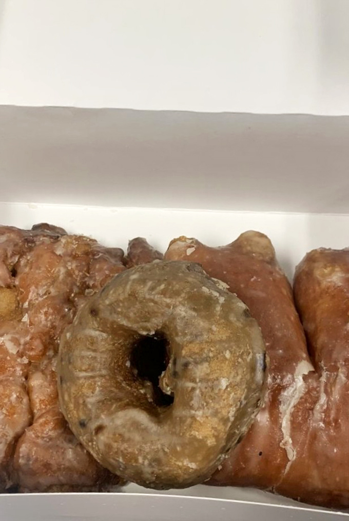 This apple fritter isn't just a donut – it's a commitment. Crispy, craggly edges giving way to tender, apple-studded interior worth every calorie.