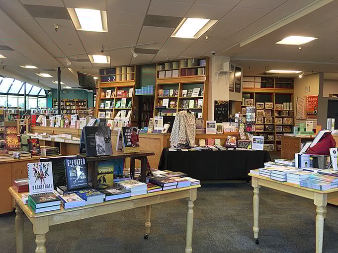 Tables laden with carefully curated selections feel like having a brilliant, well-read friend who always knows exactly what you should read next.