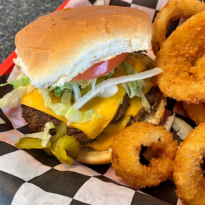 The cheeseburger and onion rings combo—proof that sometimes the simplest pleasures are the most profound. No foodie hashtags required.