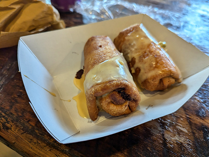 These chimichangas are wearing their golden-brown jackets with pride, glistening with cheese sauce and ready for their close-up on your Instagram... and then your stomach.