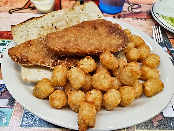 Simplicity perfected: a fish sandwich with tater tots. Proof that sometimes the most straightforward approach yields the most satisfying results.