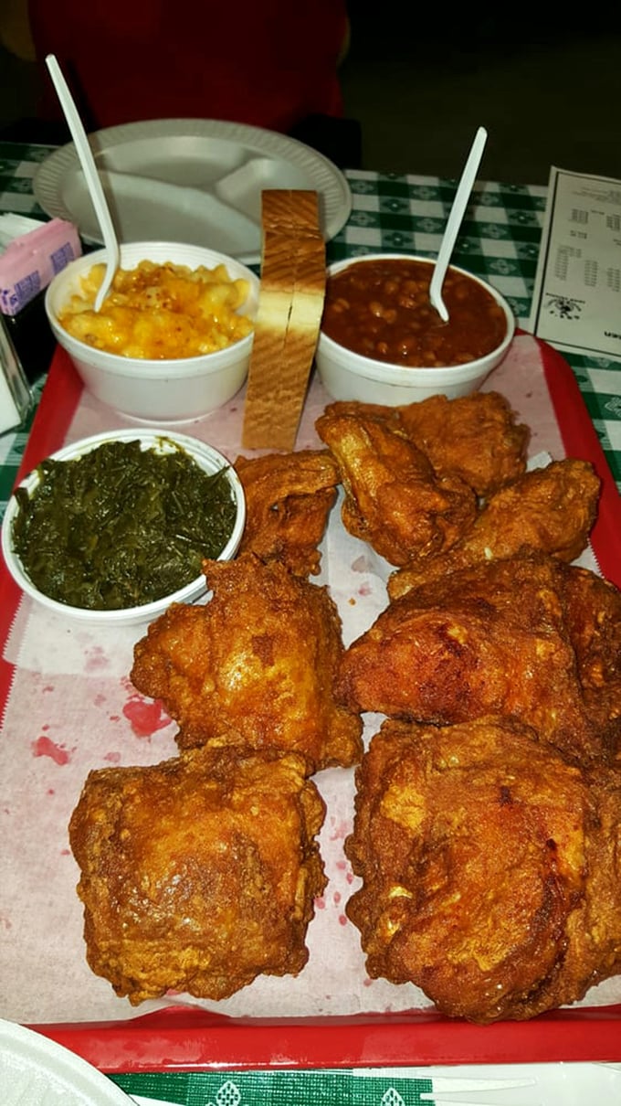 Happiness on a tray: crispy chicken surrounded by Southern classics. Your diet called—it's taking the day off.
