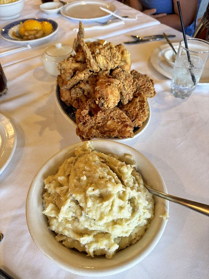 This isn't just dinner; it's edible architecture – a monument to comfort food with chicken as the golden cornerstone of Kansas cuisine.