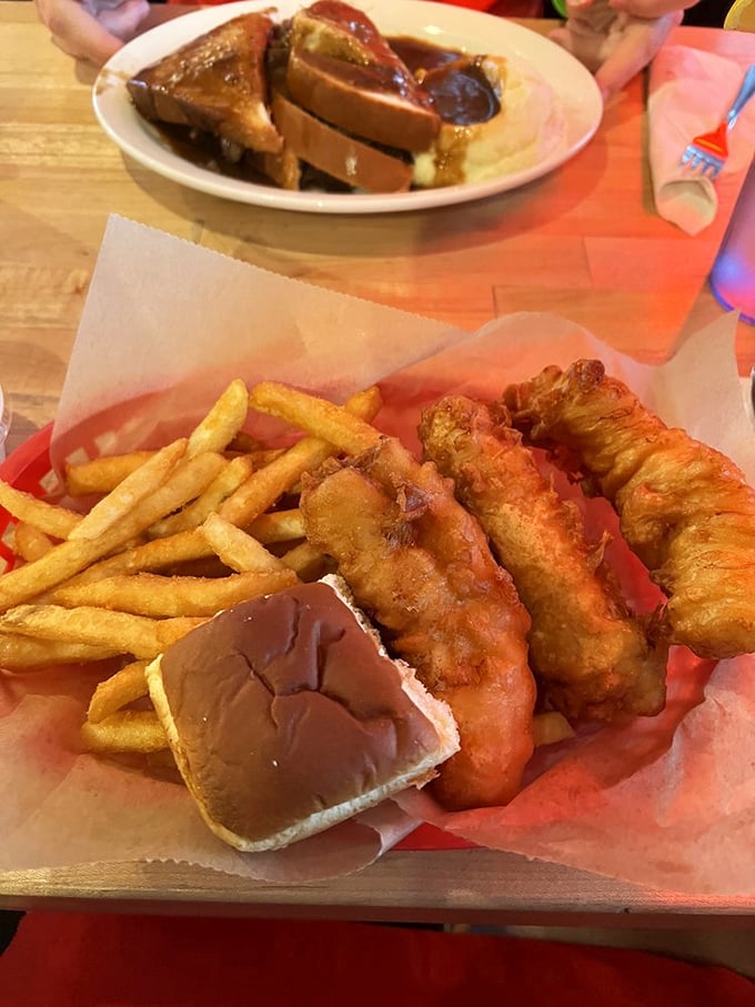 The French toast upstairs is living its best life, but those golden-battered fish fillets below are the real showstoppers. Crispy outside, flaky inside—the diner seafood of dreams.