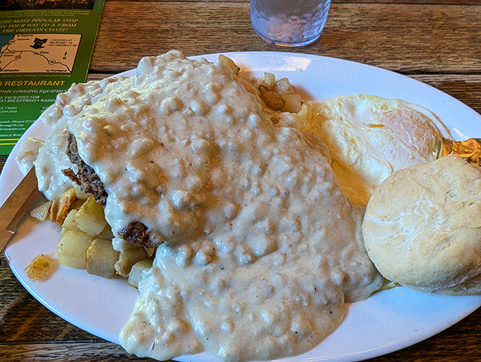 This isn't just country fried steak—it's a gravy-laden landscape where your fork becomes an eager explorer in a delicious wilderness.
