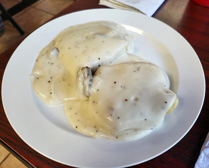 Behold the crown jewels of Loganville—two perfectly breaded steaks swimming in a sea of peppery white gravy that could make a vegetarian question their life choices.