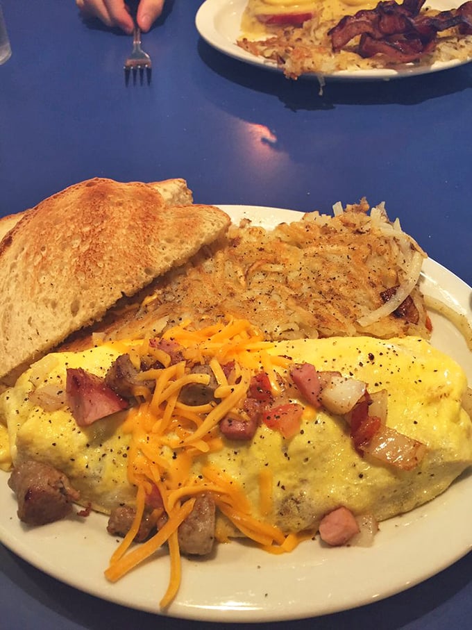 Behold the marriage of fluffy omelet and crispy hash browns. A relationship counselor couldn't design a more perfect union.
