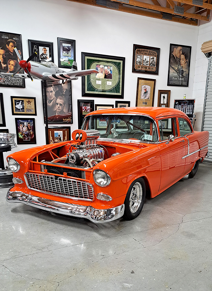 This flaming orange '55 Chevy isn't just a car—it's rolling sculpture with an engine that could wake the neighbors three blocks away.