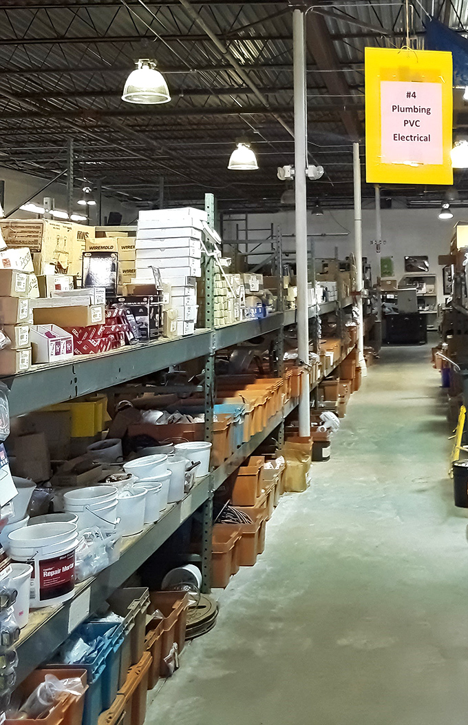 The plumbing section is organized chaos at its finest. Those orange bins hold solutions to problems you didn't even know you had yet.