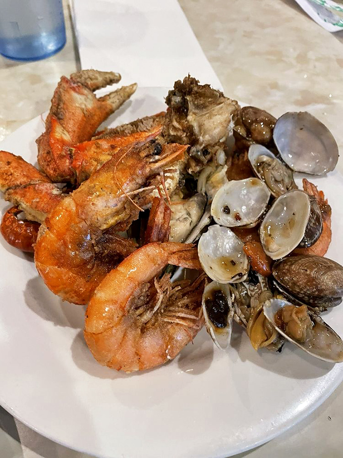 Crab legs and honey walnut shrimp share real estate on this plate—a property value that would make any Portland realtor jealous. 