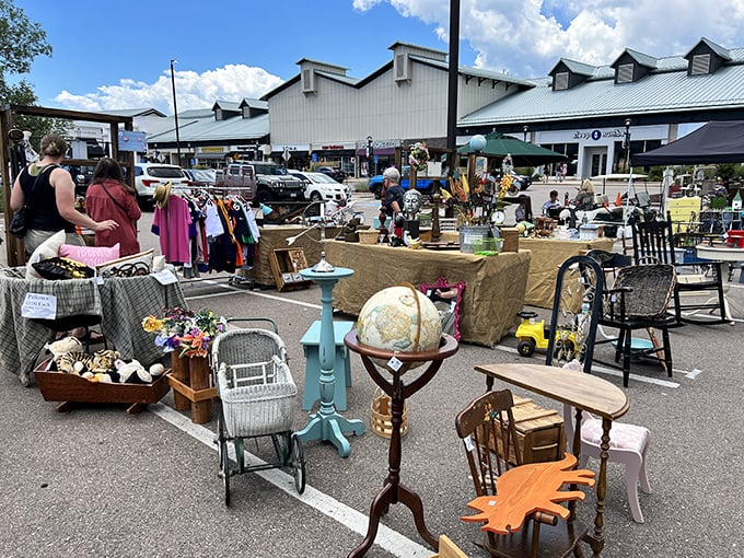 Antique furniture under blue skies—like shopping in a fancy outdoor living room where everything's for sale.