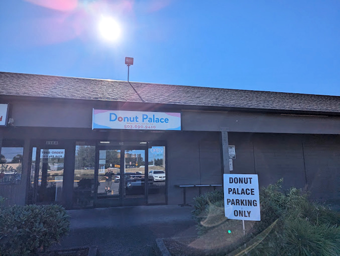 Don't let the humble sign fool you—inside awaits royalty of the fried dough variety. No crowns required, just an appetite.