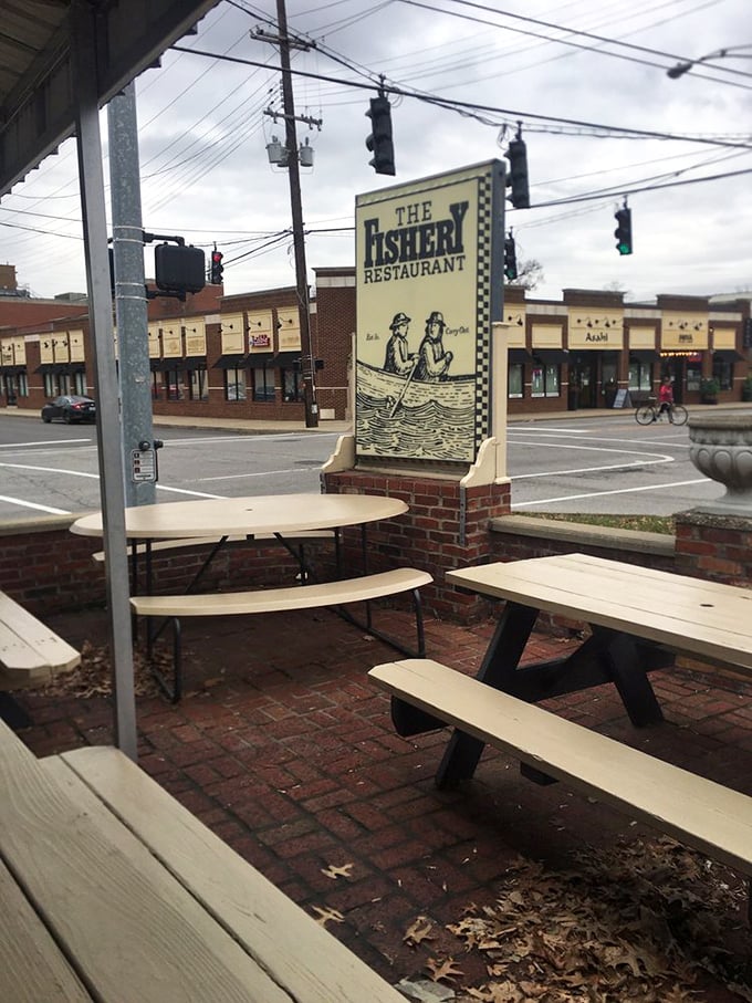 The Fishery's vintage sign featuring two anglers tells you everything – simple food with history on its side.