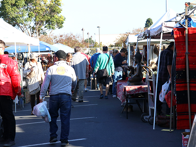 The Long Beach Antique Market sprawls beneath palm trees and blue skies. Time travel has never been this accessible—or this fun!