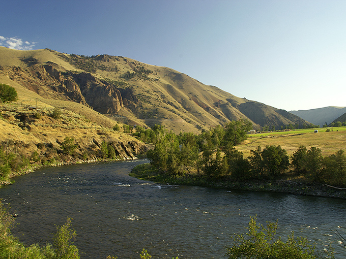 The Salmon River curves gracefully through town – Mother Nature's retirement gift that keeps on giving year-round.
