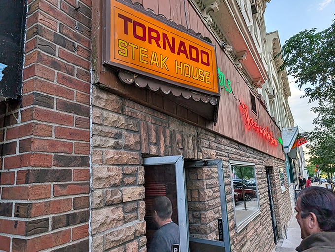 Tornado's retro sign glows like a beacon for the beef-obsessed. Downtown Madison's answer to "Where can I get a proper steak?"
