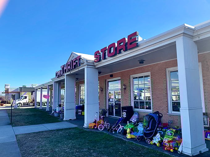 Children's toys and outdoor gear line the entrance at CHKD Thrift. A playground of possibilities for kids and parents alike!