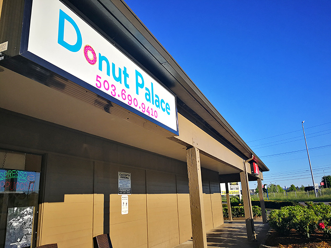 That "Parking Only" sign is less a warning and more a promise: park here and experience donut nirvana just steps away.