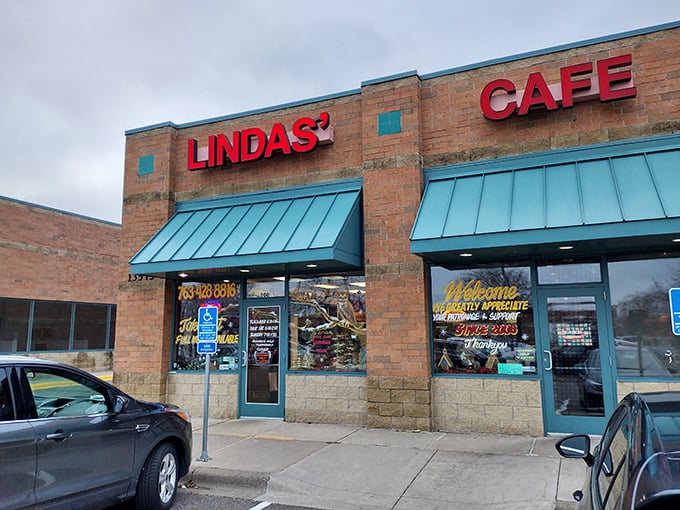 Lindas' Cafe: That blue awning isn't just for show—it's marking the spot where comfort food reaches art form status in Rogers.