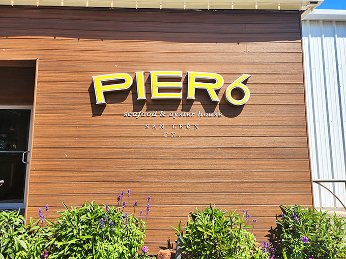 The clean lines and yellow signage of Pier 6 might look fancy, but inside it's all about honest-to-goodness Gulf seafood.