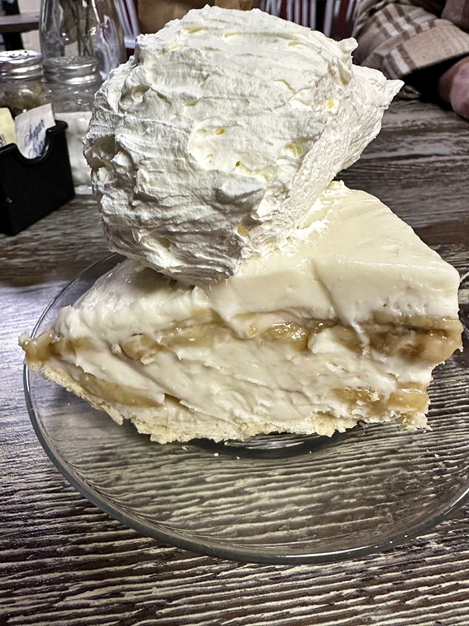 This banana cream pie isn't playing around. Layers of real bananas, silky custard, and a cloud of fresh whipped cream on a perfect crust.