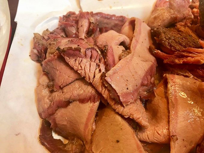 Brisket this tender should be illegal in at least seven states. Each slice carries the perfect balance of smoke, spice, and beefiness.