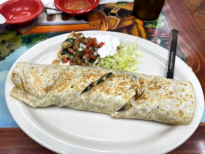 The burrito that launched a thousand food pilgrimages. Perfectly grilled, expertly wrapped, and waiting to change your definition of satisfaction.