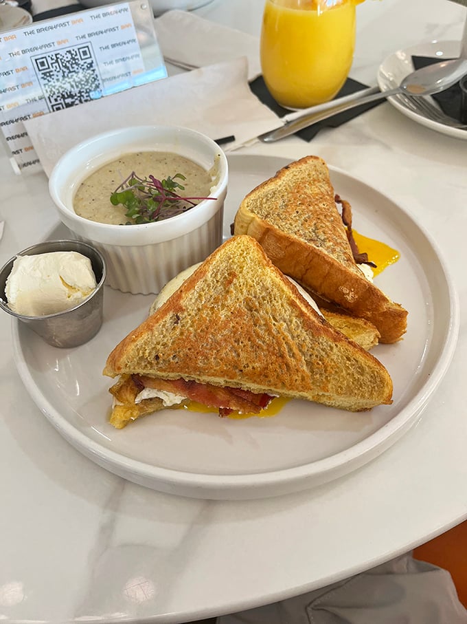The breakfast sandwich—humanity's brilliant solution to eating a complete morning meal while still having one hand free for your phone.