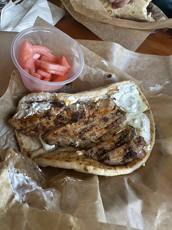 The chicken gyro sandwich – where grilled poultry meets tzatziki in a handheld romance that puts most Hollywood love stories to shame.