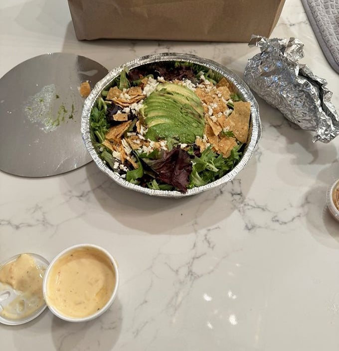 This isn't just any salad—it's what happens when vegetables finally get the respect they deserve. That avocado is practically posing for its glamour shot.
