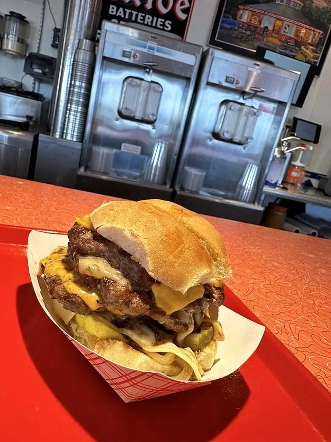 This Half Pound Double Cheeseburger isn't just a meal, it's a commitment—the kind of burger that requires a strategy and possibly a nap afterward.