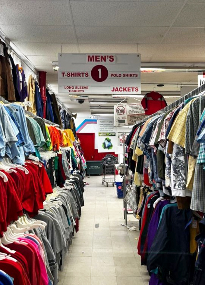 Men's department signage promises t-shirts, polos, and jackets - the holy trinity of guy-wardrobe essentials at fraction-of-retail prices.