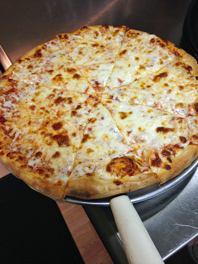 A pizza that understands the golden rule: sometimes, perfect cheese melted over simple sauce on good dough is all you need in life.