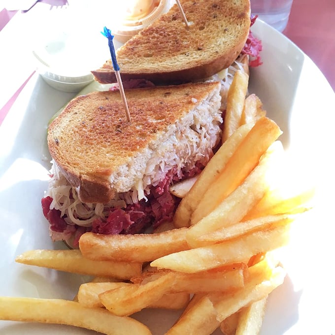 The Reuben test: proper proportion of kraut to corned beef, bread grilled to golden perfection, and fries that don't know they're sidekicks.