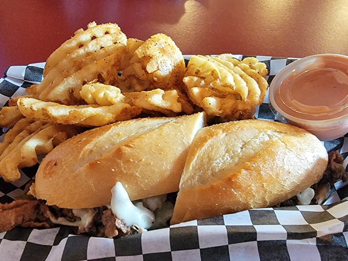 A sandwich that understands the importance of proper bread-to-filling ratio. This isn't lunch; it's an engineering marvel with onion rings.