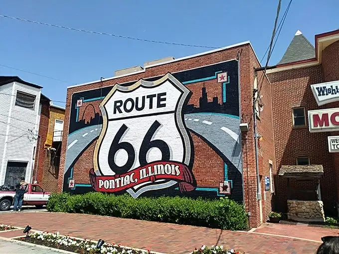 Route 66 isn't just painted on this wall; it's embedded in Pontiac's DNA, a visual celebration of America's most famous stretch of asphalt dreams.