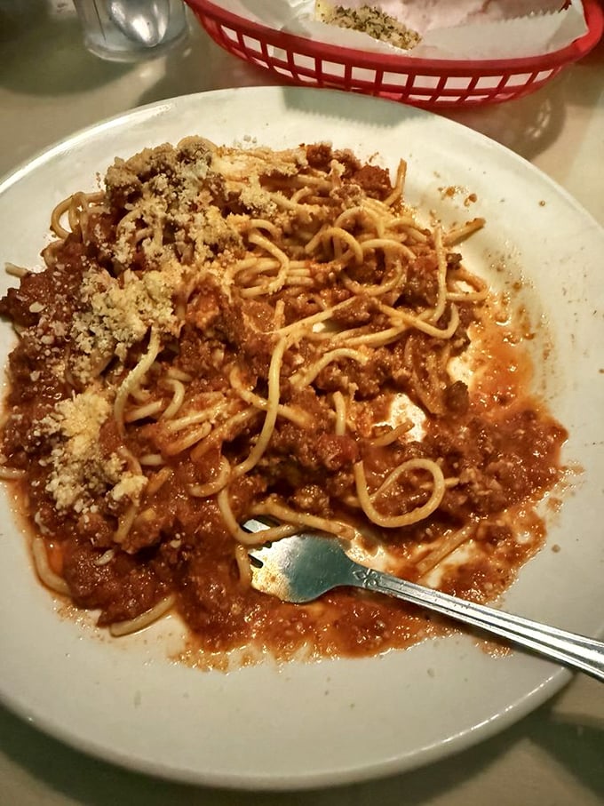 Spaghetti with meat sauce that doesn't hide behind fancy plating—just honest-to-goodness flavor that demands to be twirled and savored.