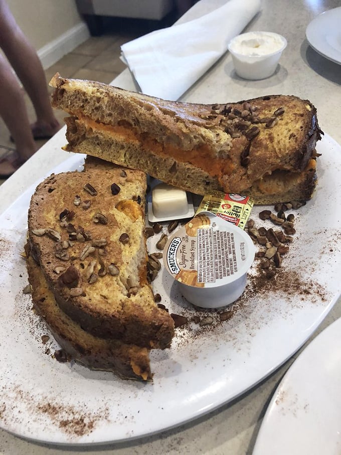 This isn't just French toast—it's architectural breakfast brilliance with nuts, possibly sweet potato, and a sprinkle of culinary magic.