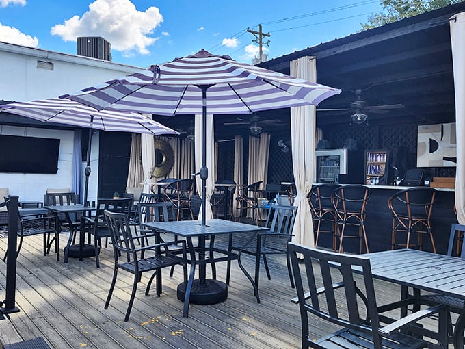 The Feed Sack's outdoor dining deck offers the perfect respite for weary shoppers—because hunting for treasures burns calories that demand immediate replacement.