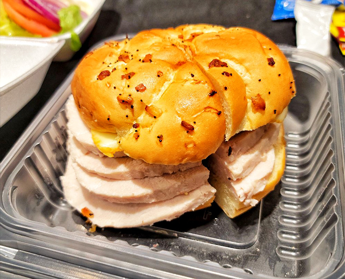 A sandwich shouldn't require unhinging your jaw like a python, but when it's this good, you'll find a way.