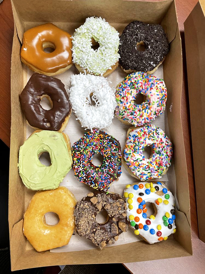 Donut boxes should come with warning labels: "Opening this lid may cause spontaneous joy and the immediate cancellation of all diet plans."