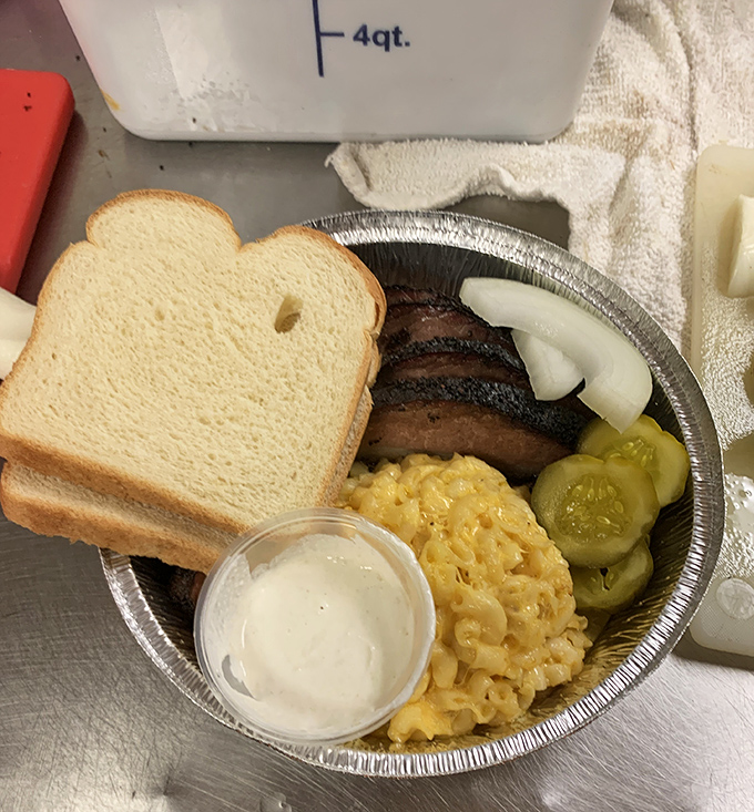 Not just pies! This hearty plate features brisket, mac and cheese, and pickles—comfort food that hugs your soul from the inside out.